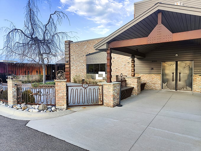 The welcoming entrance of Bad Brads stands guard over smoky secrets &ndash; those brick pillars have absorbed years of mouthwatering aromas.