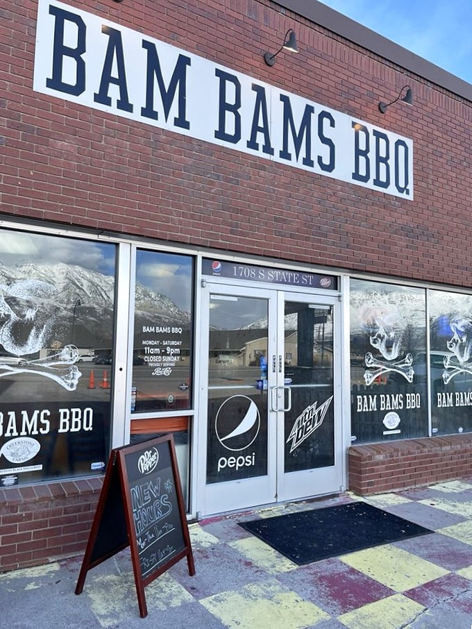 Mountains frame Bam Bams' no-nonsense entrance. That Pepsi sign isn't the only thing refreshing about this Orem BBQ haven!
