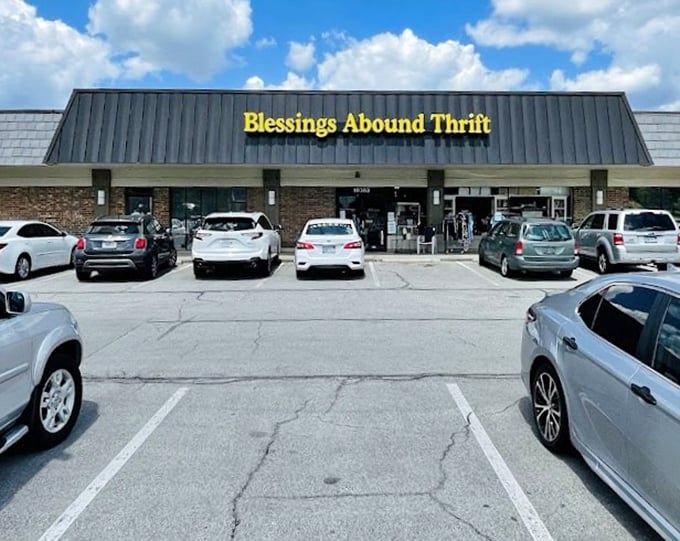 Parking lot packed with possibility-seekers, Blessings Abound's sunshine-yellow sign practically sings against that perfect Kansas blue&mdash;bargain heaven awaits!