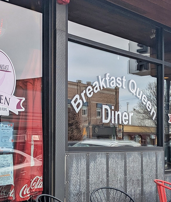 The window proudly announces "Breakfast Queen Diner" to passing Englewood residents. Royal treatment comes standard with every coffee refill here.