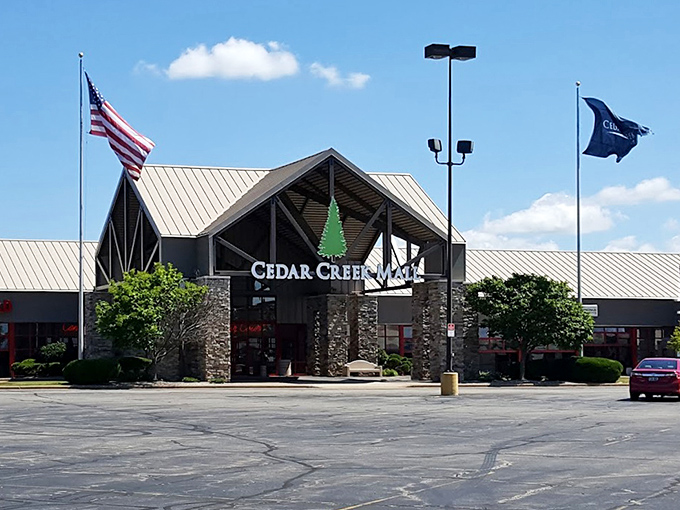 Cedar Creek Mall: American flag flying proudly over shopping central&mdash;because finding great deals is practically your patriotic duty!