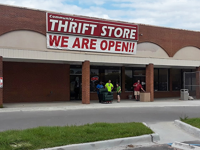 The enthusiastic "WE ARE OPEN" banner tells you everything about this store's excitement for serving customers.