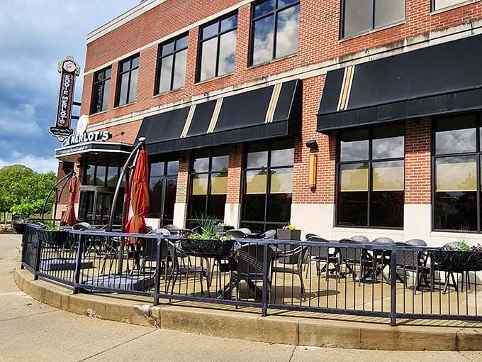 The welcoming patio at Eddie Merlot's &ndash; where summer evenings and sizzling steaks create memories that last all winter.