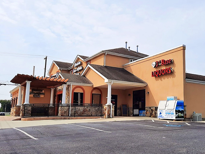 Covered entrance and warm colors signal a neighborhood gathering place where everyone knows your usual order by heart.