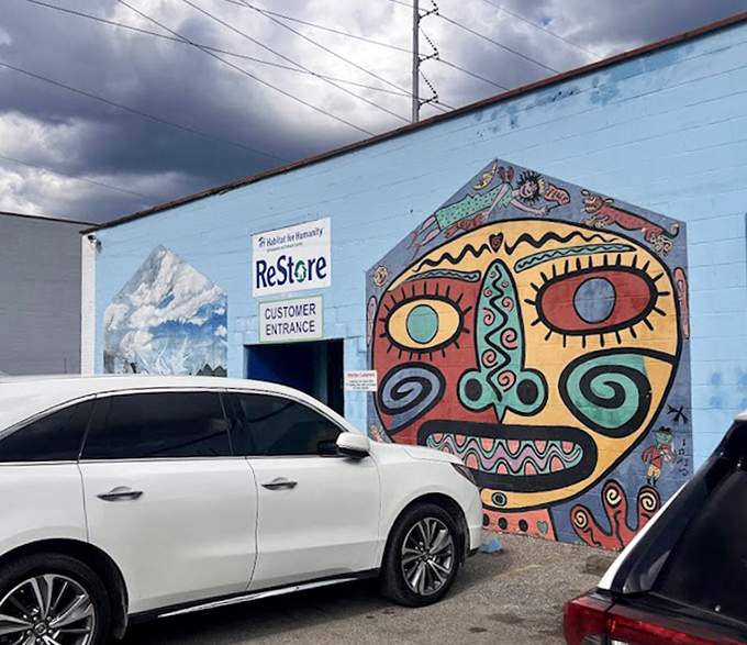 That vibrant mural tells you this isn't your grandmother's dusty old thrift shop experience.