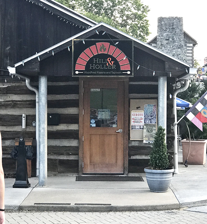 Where pizza meets Appalachian charm &ndash; Hill & Holler's entrance promises wood-fired delights in a picture-perfect setting.