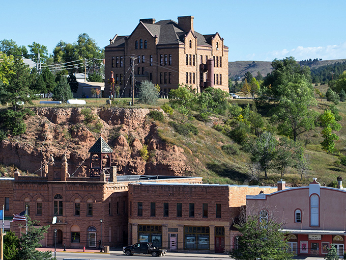 Sandstone buildings climb the hillside in Hot Springs, where natural beauty and small-town affordability create the perfect retirement recipe.