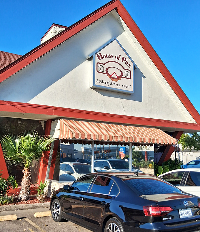 The red-trimmed awning of House of Pies welcomes you to calorie paradise. Where "I'll just have coffee" quickly becomes "and a slice of Bayou Goo, please."