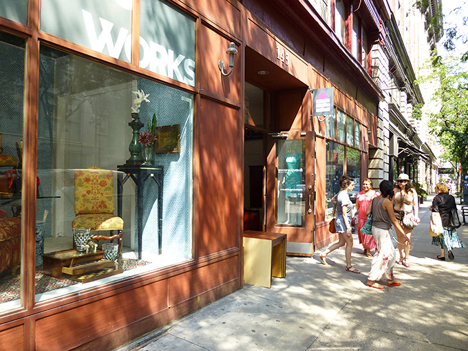 Thrifting for the discerning New Yorker! Housing Works' sunny display showcases a yellow-patterned chair that whispers of Manhattan apartments and weekend dinner parties.