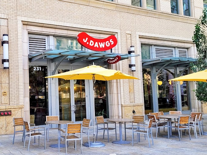 Those yellow umbrellas are like little sunny spots of joy, promising shelter and spectacular hot dogs in equal measure.