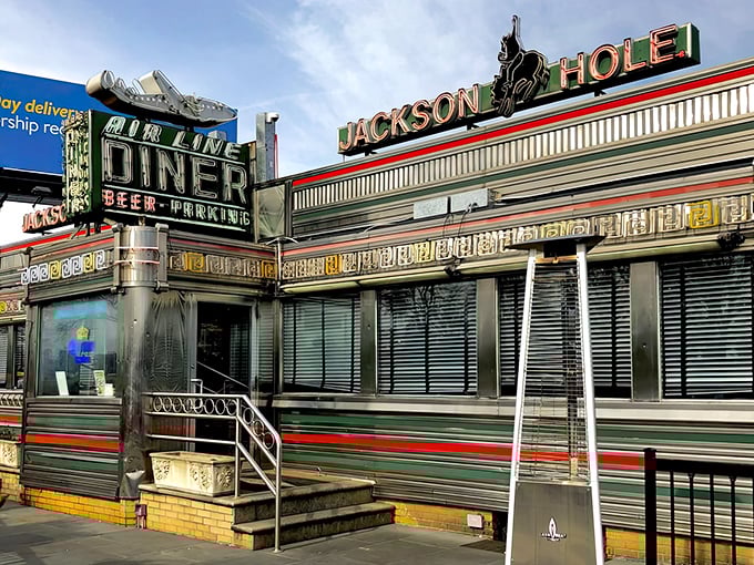 That iconic bucking bronco sign promises breakfast with attitude. Jackson Hole's vintage diner car design never goes out of style!
