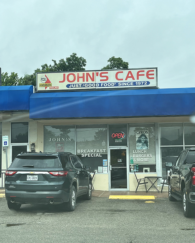 The iconic blue-trimmed sign of John's Cafe has guided hungry Dallasites to breakfast nirvana for half a century.