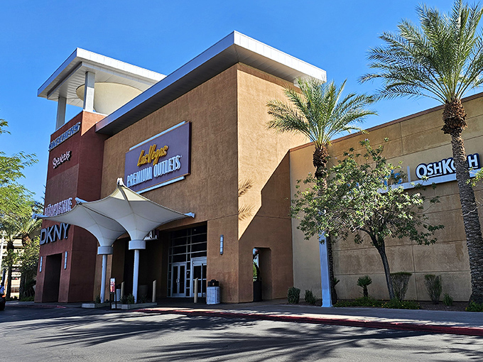 When outlet shopping meets desert oasis vibes, complete with palm trees swaying over your bargain hunting adventures.