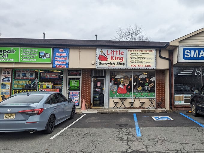 Nestled between everyday shops, Little King's cheerful facade stands ready to serve sandwiches fit for royalty.