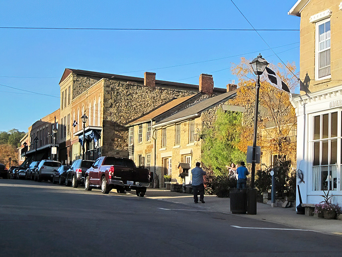 The sun casts a golden glow on Mineral Point's limestone buildings, highlighting the craftsmanship of the Cornish miners who built them.
