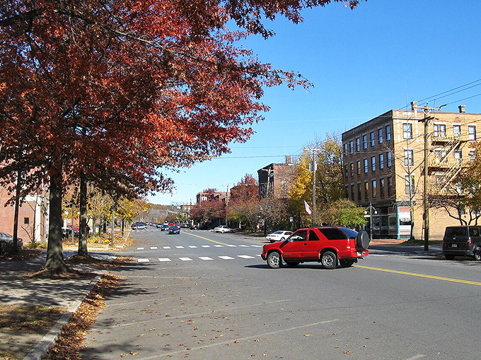 These weathered facades have seen generations pass by, each leaving their mark on this riverside community.
