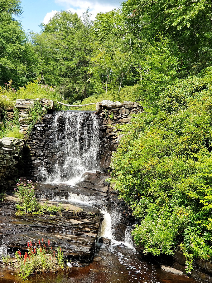 Cascading beauty in stone and water. Moore's historic waterfall has been soothing souls for generations.