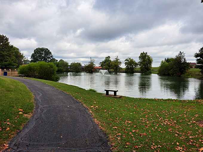 A serene pond with dancing fountains creates a postcard-perfect scene in Mount Sterling, where natural beauty comes at small-town prices.