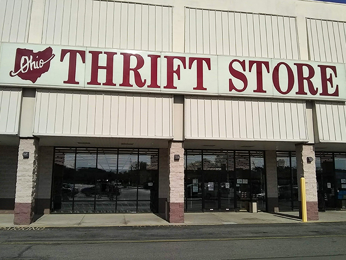 The distinctive Ohio-shaped logo makes this thrift store feel like a hometown hero. Sunlight gleams off windows promising discoveries inside.