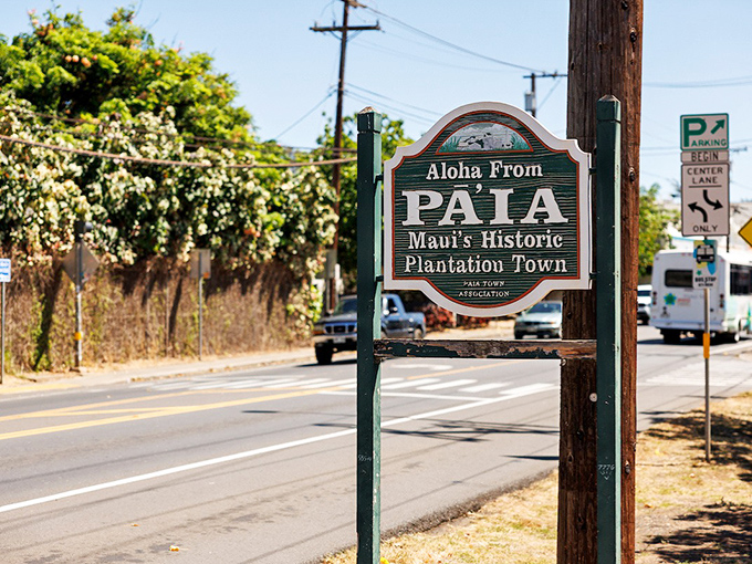 The "Aloha from Pā'ia" sign welcomes visitors to Maui's historic plantation town turned surfer haven.