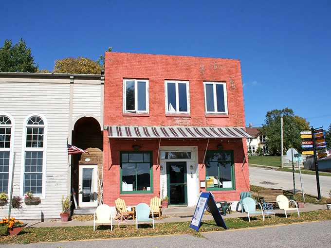 Pepin's charming downtown features this eye-catching red brick building, where colorful patio chairs invite visitors to sit and watch the world go by.