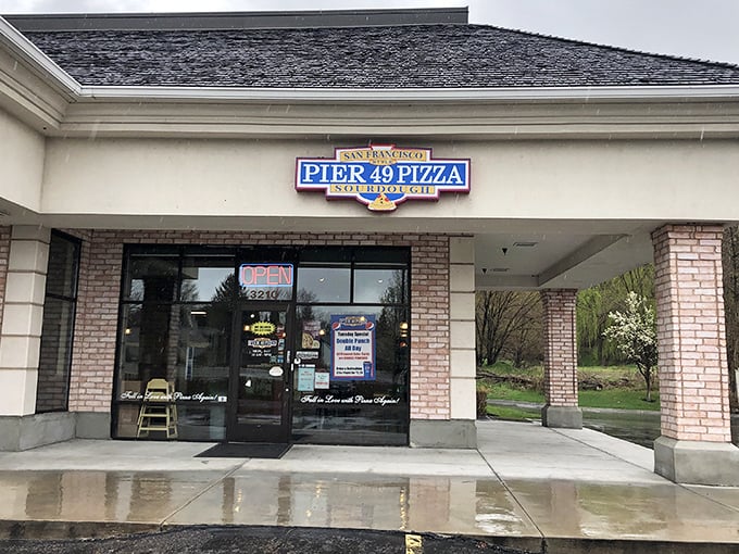 Rain-slicked sidewalks can't dampen the warm sourdough welcome waiting inside Pier 49. Pizza worth getting wet for.