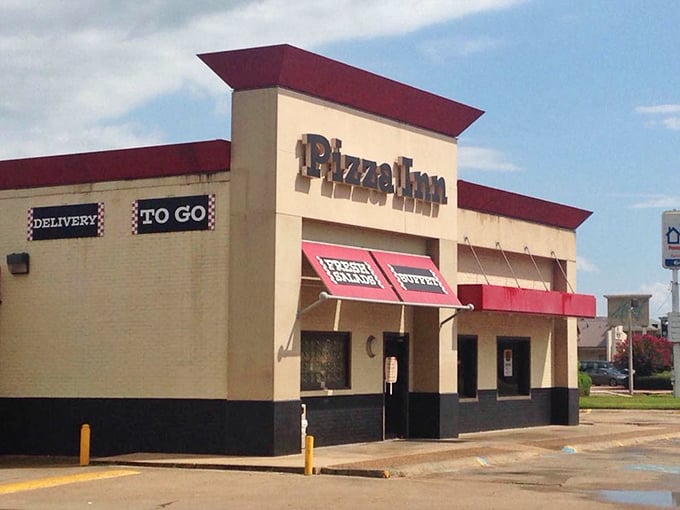 Pizza Inn's classic storefront promises reliable pizza pleasure. Sometimes you want your pizza without any surprises!