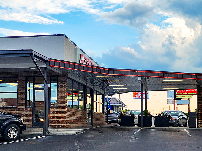 The sunset casts a golden glow on Pizza Palace, where Knoxville residents have been getting their pizza fix for generations.
