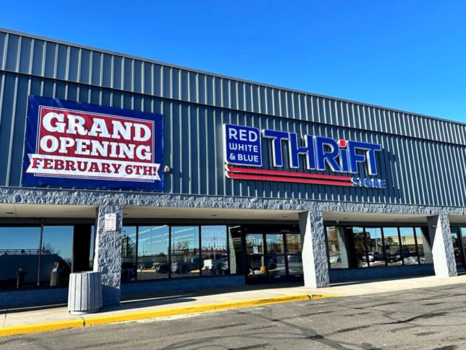 "Grand Opening" promises fresh thrifting adventures in Arvada. Even the building looks excited about its new life!