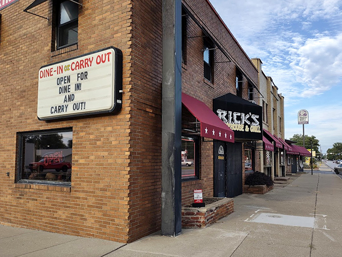Brick, awnings, and BBQ &ndash; a simple formula for happiness. This street view hides flavor explosions waiting inside.