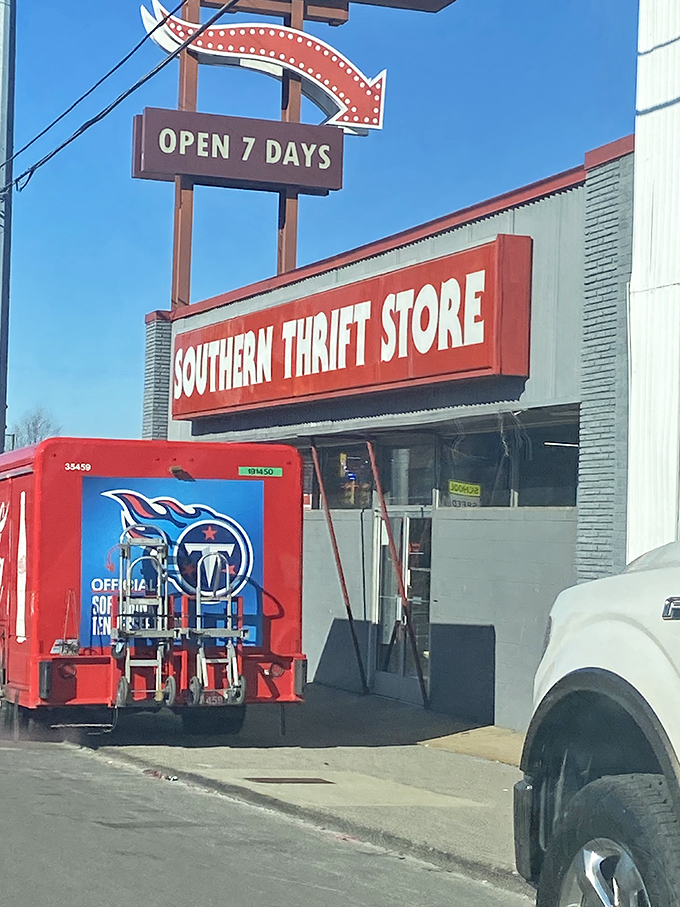 The classic red signage of Southern Thrift Store stands proudly alongside a glimpse of Tennessee Titans pride.