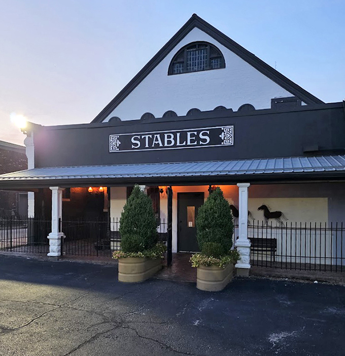 Evening lights illuminate this unique building where the atmosphere matches the quality of every perfectly grilled steak served.