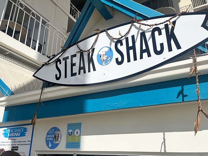 The surfboard sign says it all&mdash;Steak Shack's no-frills facade hides flavor bombs that would make celebrity chefs drop their spatulas in awe.
