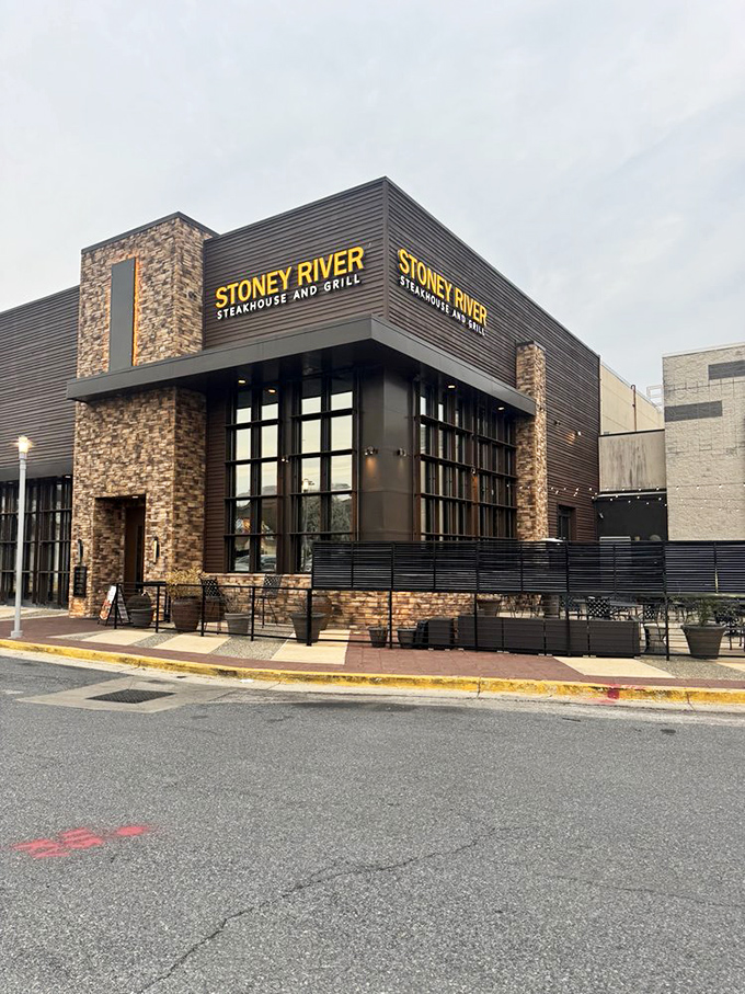 Stone and wood exterior hints at the cozy-yet-upscale atmosphere where your next perfect ribeye is waiting patiently.