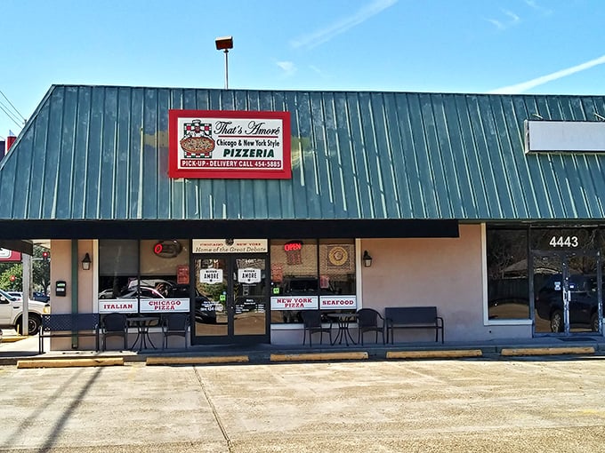 Under that distinctive green roof lies pizza paradise &ndash; That's Amore delivers on its name with every cheesy, perfect bite.