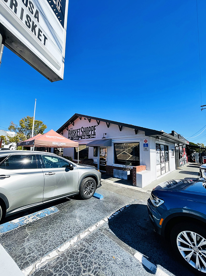 Bright blue skies frame this unassuming BBQ treasure. The Brisket Shoppe proves great things come in simple packages.