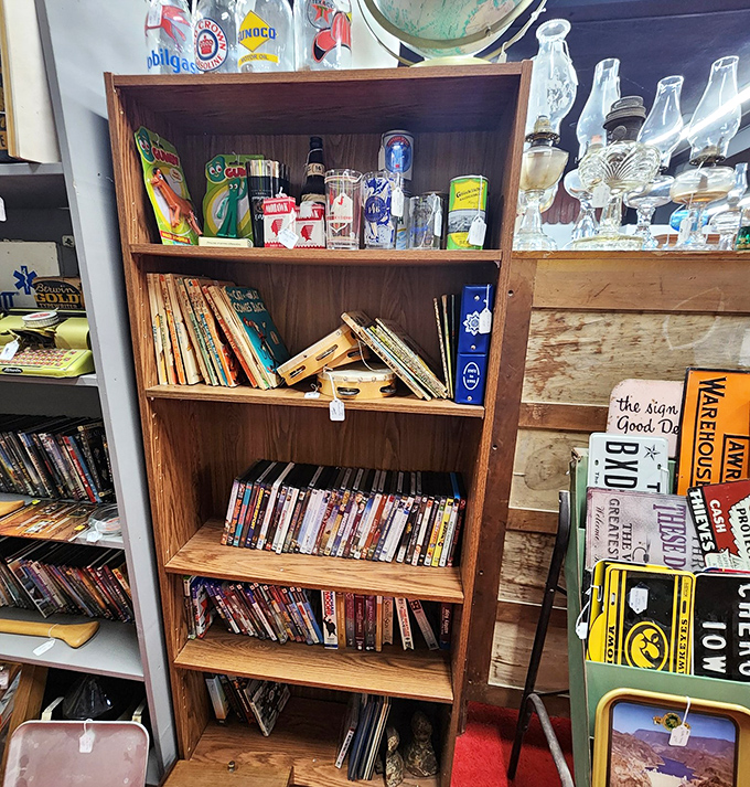 Vintage wagon wheels stand guard outside The Corner Flea Market, hinting at the timeless treasures within.