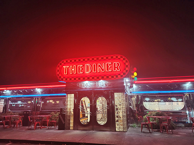 Night or day, that classic neon sign beckons hungry travelers with promises of comfort food and bottomless coffee.