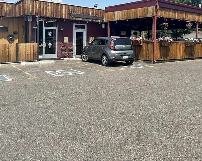 That wooden patio practically begs you to linger over one more piece of chicken while watching the world go by.