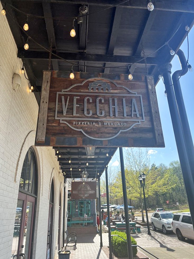 That wooden sign hanging outside Vecchia isn't just decoration &ndash; it's your first clue you're about to experience pizza nirvana.