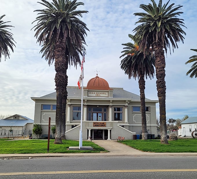 Palm trees frame this beautifully preserved schoolhouse, where Arizona's frontier children once learned their ABCs and history.