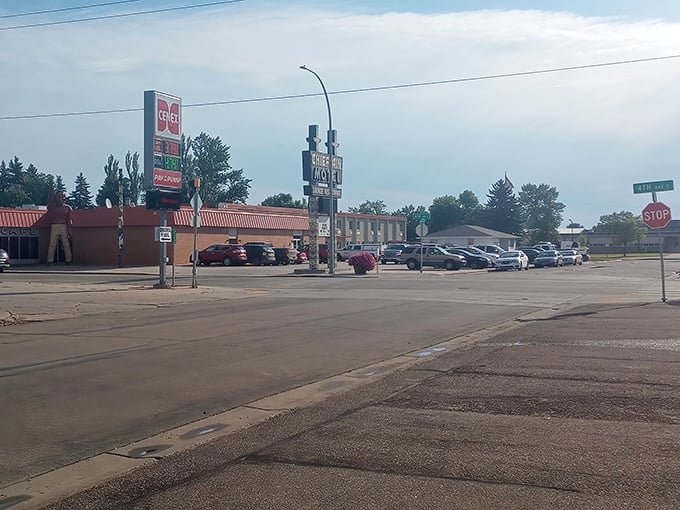 DQ's familiar sign welcomes hungry travelers. In small towns, ice cream isn't just dessert&mdash;it's a community gathering point.