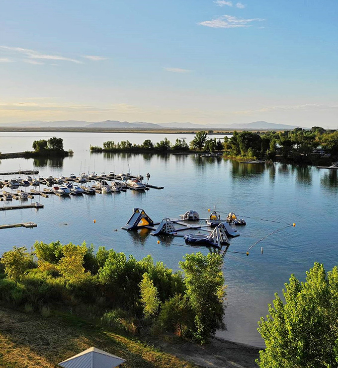 Bird's eye bliss! The marina cradles boats while inflatable adventures await&mdash;proof that Willard Bay offers both serenity and shenanigans in equal measure.