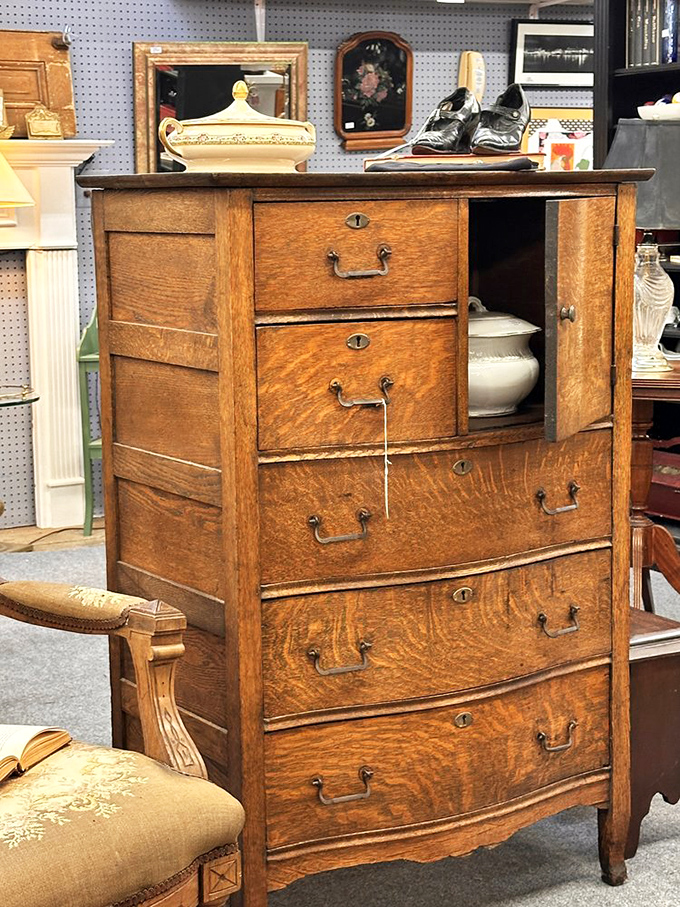 This oak dresser has survived longer than most marriages. Each drawer probably contains the ghost of someone's secrets.