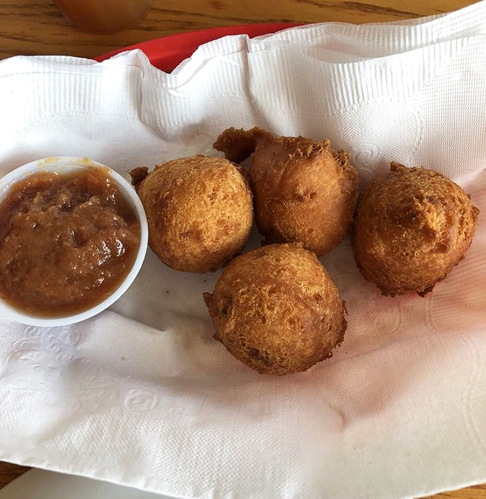 These apple fritters aren't just fried dough&mdash;they're little golden orbs of joy, crispy outside and pillowy inside, served with apple butter for double apple impact.