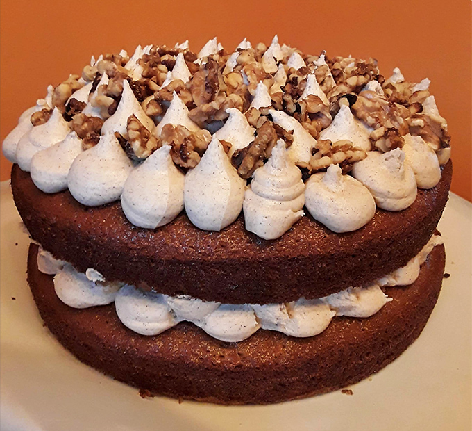 This isn't just dessert &ndash; it's an architectural achievement of cream, cake, and walnuts that makes birthday candles seem entirely unnecessary.