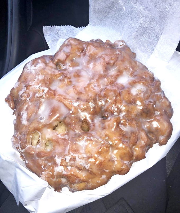 The apple fritter: a topographical masterpiece of peaks and valleys, each crevice hiding pockets of cinnamon-apple bliss.