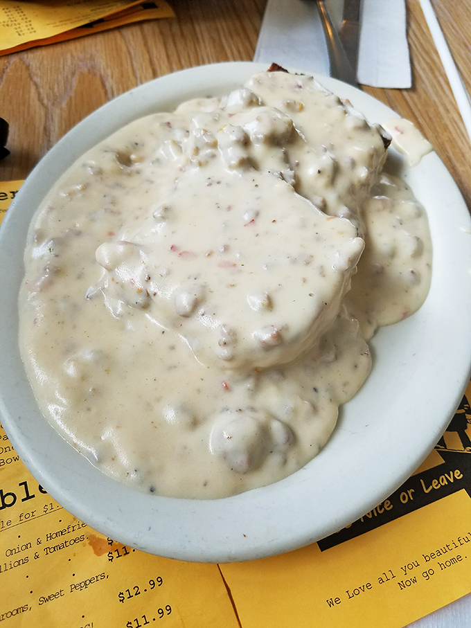 Biscuits and gravy that require a topographical map to navigate. This comfort food mountain range has its own weather system of pepper flakes.