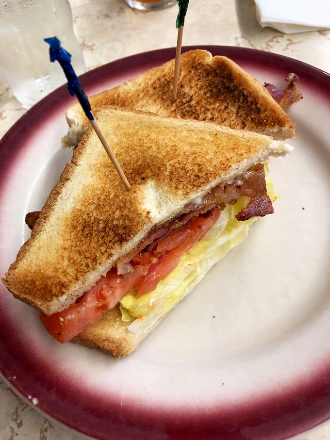 This sandwich isn't just a BLT&mdash;it's architecture. Perfectly toasted bread supporting the timeless trio of bacon, lettuce, and tomato.