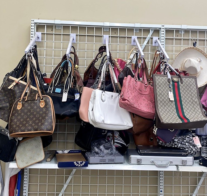 Designer handbags hanging like exotic fruit, ripe for the picking. That Gucci tote is practically begging for a second chance.